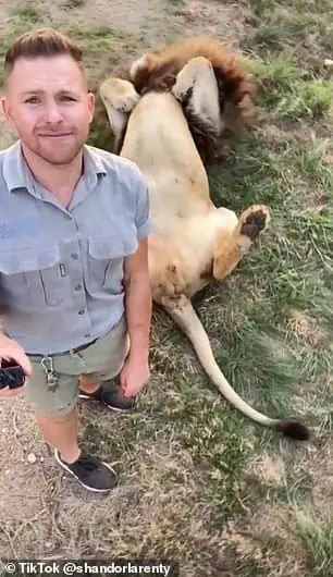 Meet the Young Lion Tamer and His Best Friend, a Majestic Lion Named George
